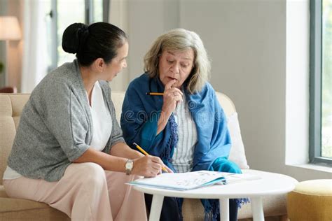 Nursing Home Patients Solving Crossword Stock Image Image Of Lifestyle Learning
