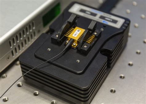 Fast Nanosecond Switching Low Linewidth Widely Tunable Laser