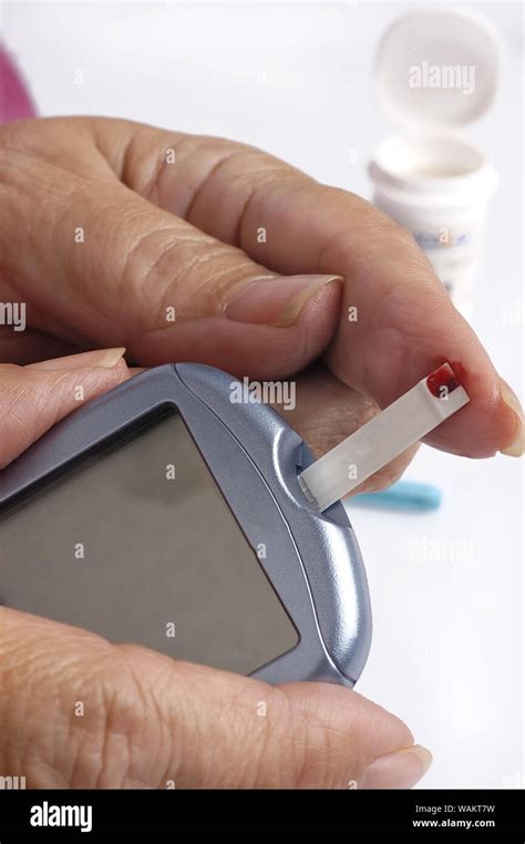 A Diabetic Taking A Glucose Reading Stock Photo Alamy