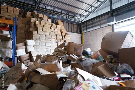 Blurry Image Of Poorly Organized Warehouse With A Lot Of Messy Stocks