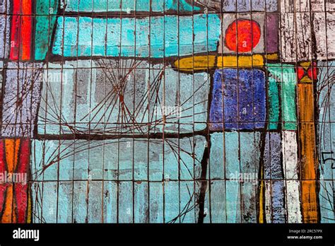 Detail From A Building Exterior Covered With Glazed Ceramic Tiles With Colorful Abstract Shapes