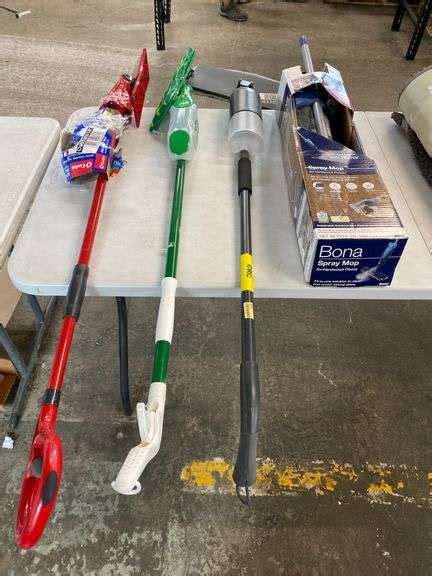 Group Lot Of Assorted Spray Mops Matthews Auctioneers