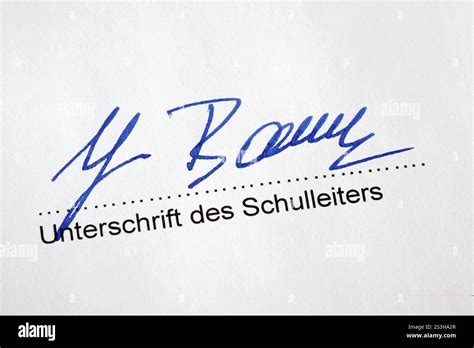 Signature On An Official School Document Reprimand Or Report Card Stock