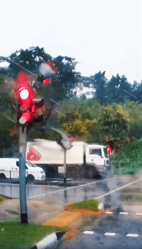 Lightning Strikes Traffic Light In Yishun Impact Sparks Flashes Of Smoke And Fire