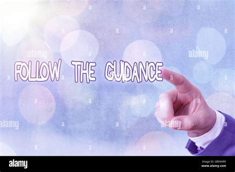 Writing Note Showing Follow The Guidance Business Concept For