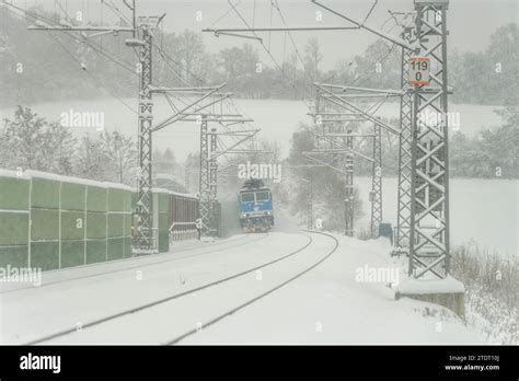 Electric Trains Near Deep Snowy Platform And Tunnel In Olbramovice CZ 12 02 2023 Stock Photo Alamy