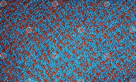 Close Up View Textured Surface With Pattern Small Orange And Blue Dots Creating Vibrant And