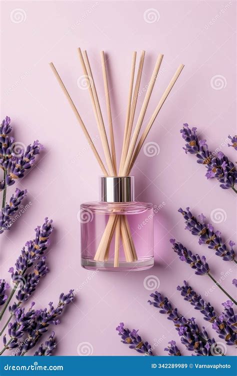 Elegant Lavender Diffuser Surrounded By Fresh Lavender Flowers On A