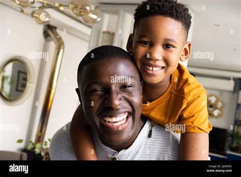 Portrait Of Smiling African American Father And Son Stock Photo Alamy