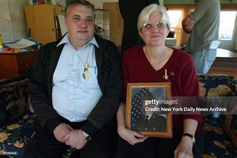 Jane Riley Holds A Photo Of Her Son Army Sgt James Riley As She