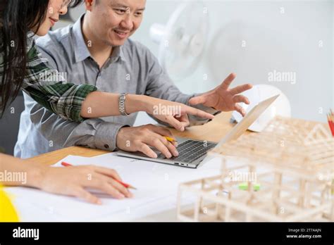 Architect Engineer Working Design A Modern House Concepts Of Building