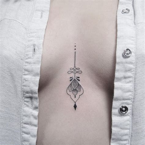 36 Of The Coolest Ideas For Between The Boobs Tattoos We Ve Ever Seen