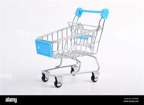 Mini Model Of Blue Shopping Cart Isolated On White Background Shopping Cart Is Empty Stock