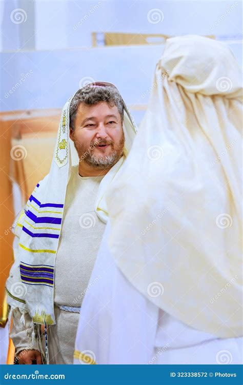 Rabbi At Religious Man Jewish Traditional Clothing Is In A Synagogue