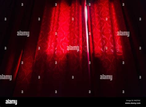 Secret Behind Red Curtain Stock Photo Alamy