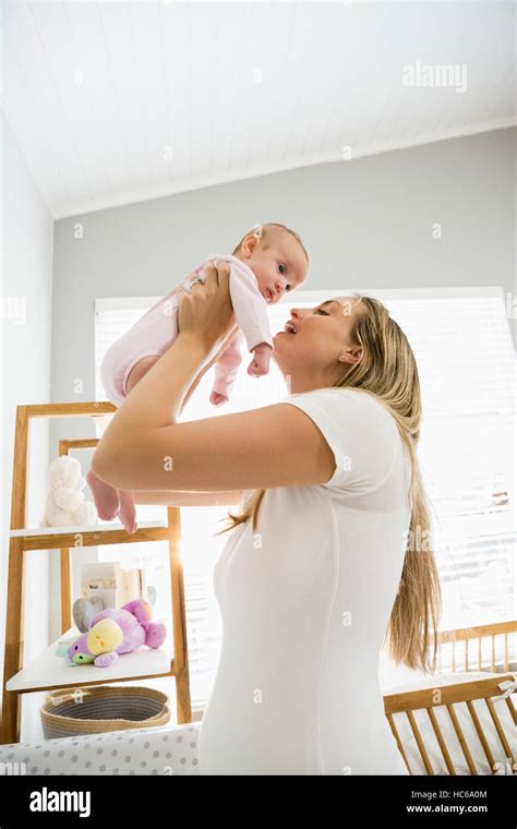 Mother Playing With Her Baby Stock Photo Alamy