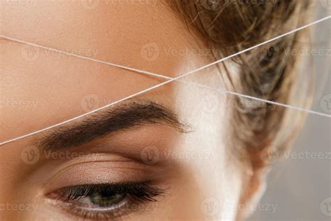 Eyebrow Threading Epilation Procedure For Brow Shape Correction Stock Photo At Vecteezy
