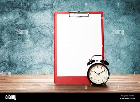 Blank Paper Sheet And Alarm Clock Stock Photo Alamy