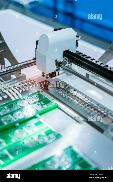 PCB Processing On CNC Machine Working In Factory Stock Photo Alamy