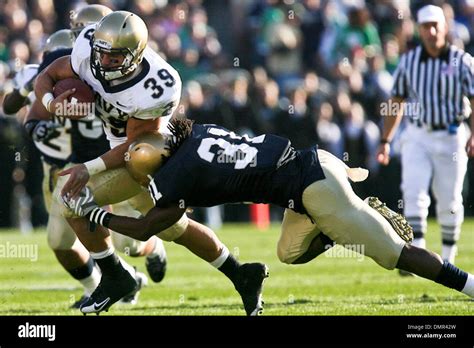 Navy Fullback Alexander Teich 39 Is Tackled By Notre Dame Safety