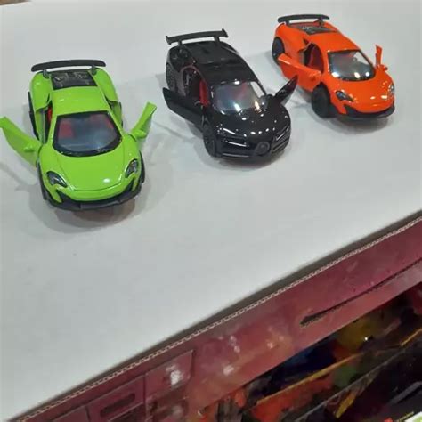 خرید و قیمت ماشین فلزی موزیکال دربازشو عقب کش چراغدار اسپرت از غرفه اسباب بازی صداقت