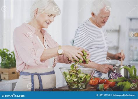 Older Woman Tossing A Salad Stock Photo Image Of Chef Love