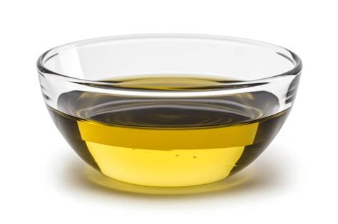 Premium Photo Oil In Small Bowl Isolated On White Background