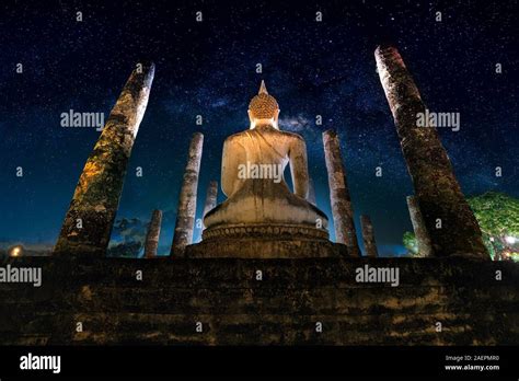 Milky Way Over Big Buddha At Night In Wat Mahathat Temple Sukhothai