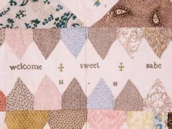 Gawthorpe Textiles Collection Online Gallery Patchwork and appliqué cot coverlet by Nancy