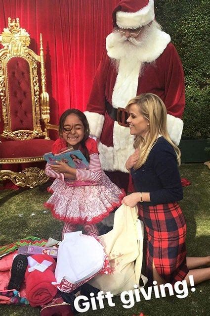 Reese Witherspoon Meeting Santa Claus Is All The Festive Cheer You Need