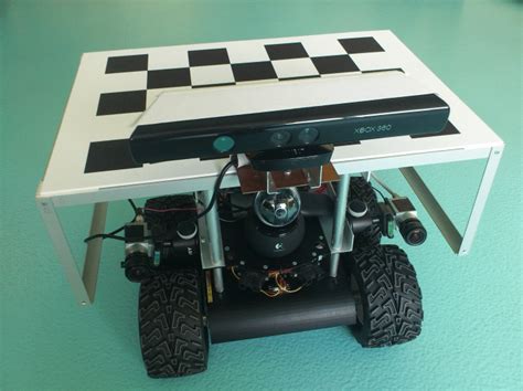 The Wifibot Robot With The Calibration Marker And The Kinect Sensor