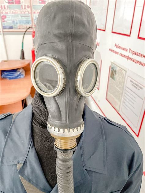 Stalker Soldier In Gas Mask And Russian Military Hoodie Jacket Looking