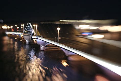 Premium Photo Blurred View Of Illuminated Bridge