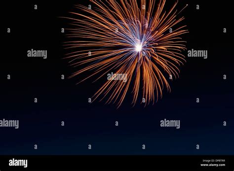 Fireworks Exploding In The Sky At Night Stock Photo Alamy