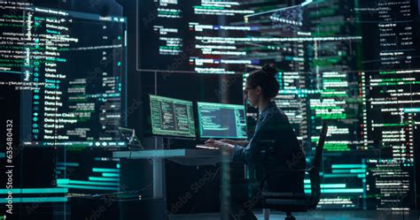 Professional Female Programmer Working In A Monitoring Control Room