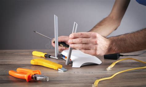 Caucasian Man Repairing Wifi Router Stock Photo Image Of Pliers Modem