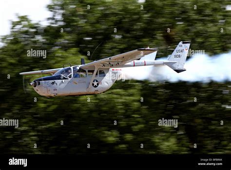 Cessna O 2 Skymaster In Flight At The Nevada County Airport In Grass