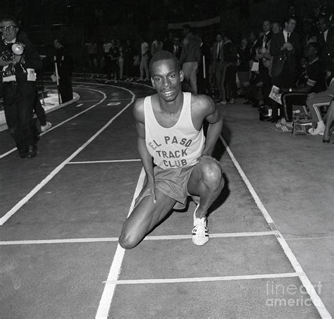 Bob Beamon Kneeling On Track Photograph By Bettmann Fine Art America
