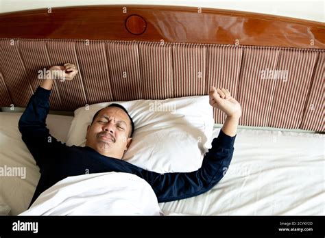 Guy Yawning In Bed