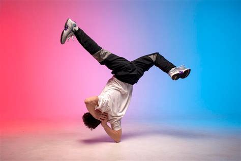 Premium Photo Young Guy Hiphop Performer Break Dance In Neon Club