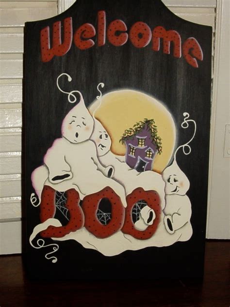 Spooky Ghosts Painted On Bread Board