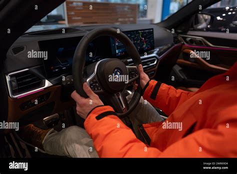 Close Up Man In Car Driving Bmw I4 Five Door Electric Liftback Class D