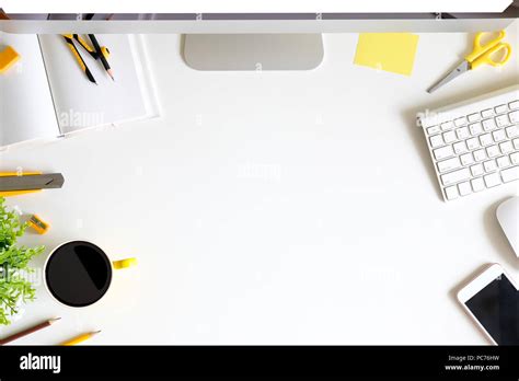 Office Desk With Computer Keyboard Smartphone Coffee Notebook And