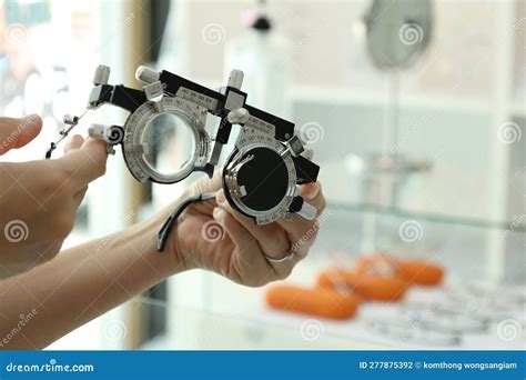 Hand Holding Glasses In Eyeglasses Shop Glasses In Female Hand Stock
