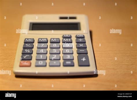 Electronic Calculator On A Desk Basic Solar Desk Calculator Representing Old Technology Focus