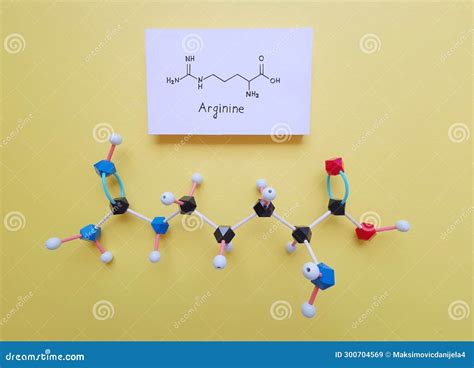 Molecular Structure Model And Structural Chemical Formula Of Arginine