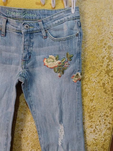 Picasso Embroidered Tattered Jeans Womens Fashion Bottoms Jeans On