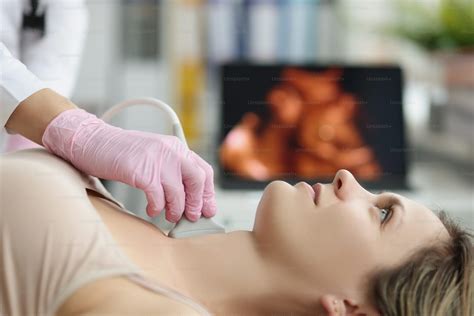 Doctors Hands On A Womans Neck Ultrasound Of The Thyroid Gland