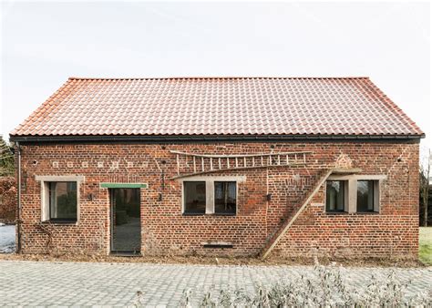 Stacked Beams Form Jenga Like Workspace Inside Former Barn In Belgium