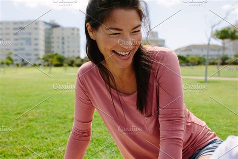 Smiling Woman In A Park
